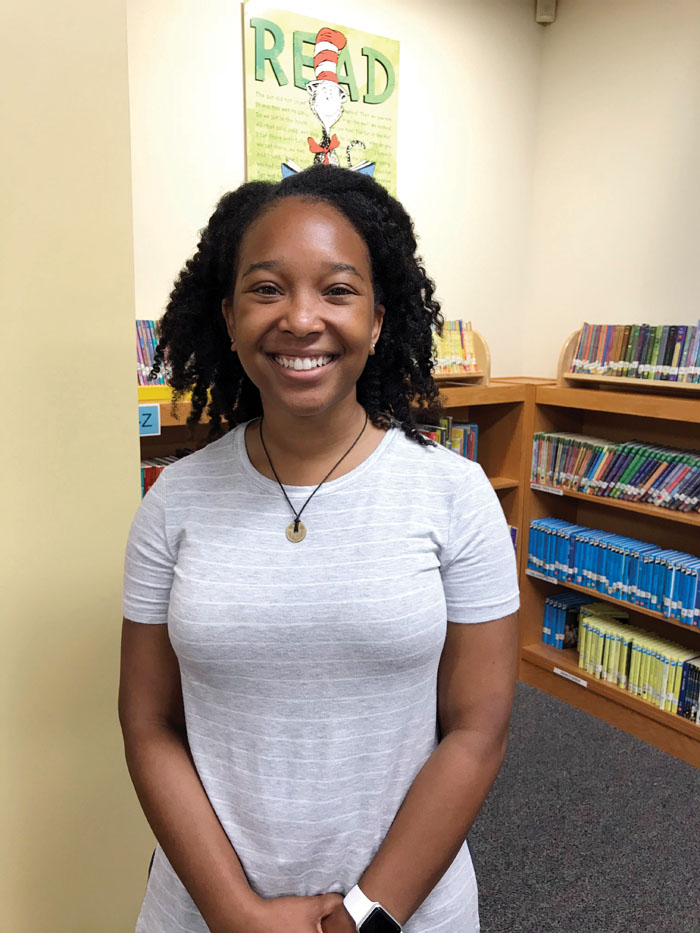 Your Neighbor: Reaching the Summit — Education, dedication pay off for ...