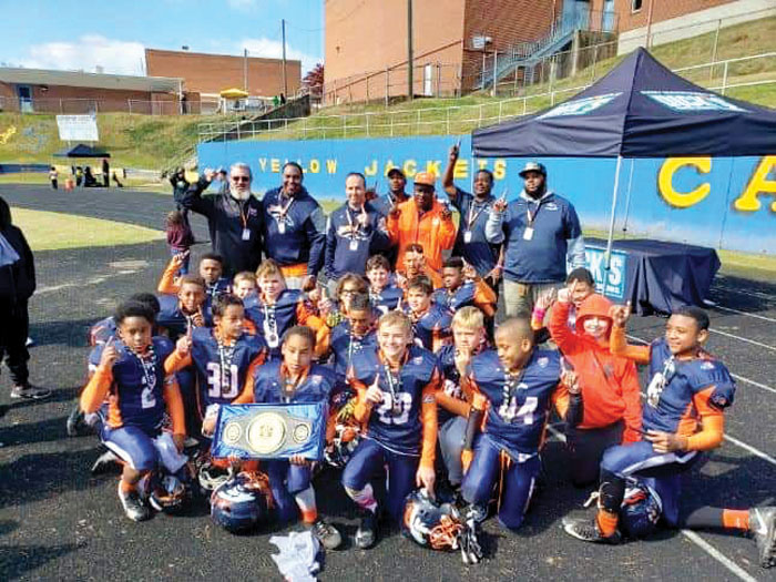 Building a team through hard work from defeated to undefeated ...