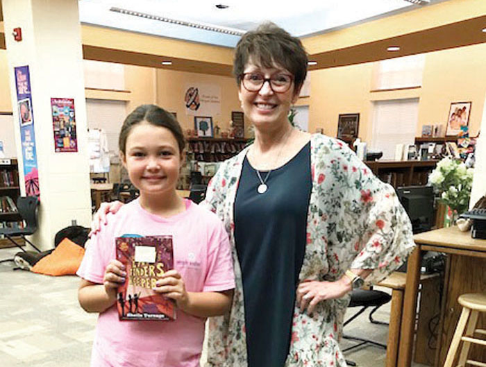 Your Neighbor: Literary life: Lisa England overcomes stomach cancer ...