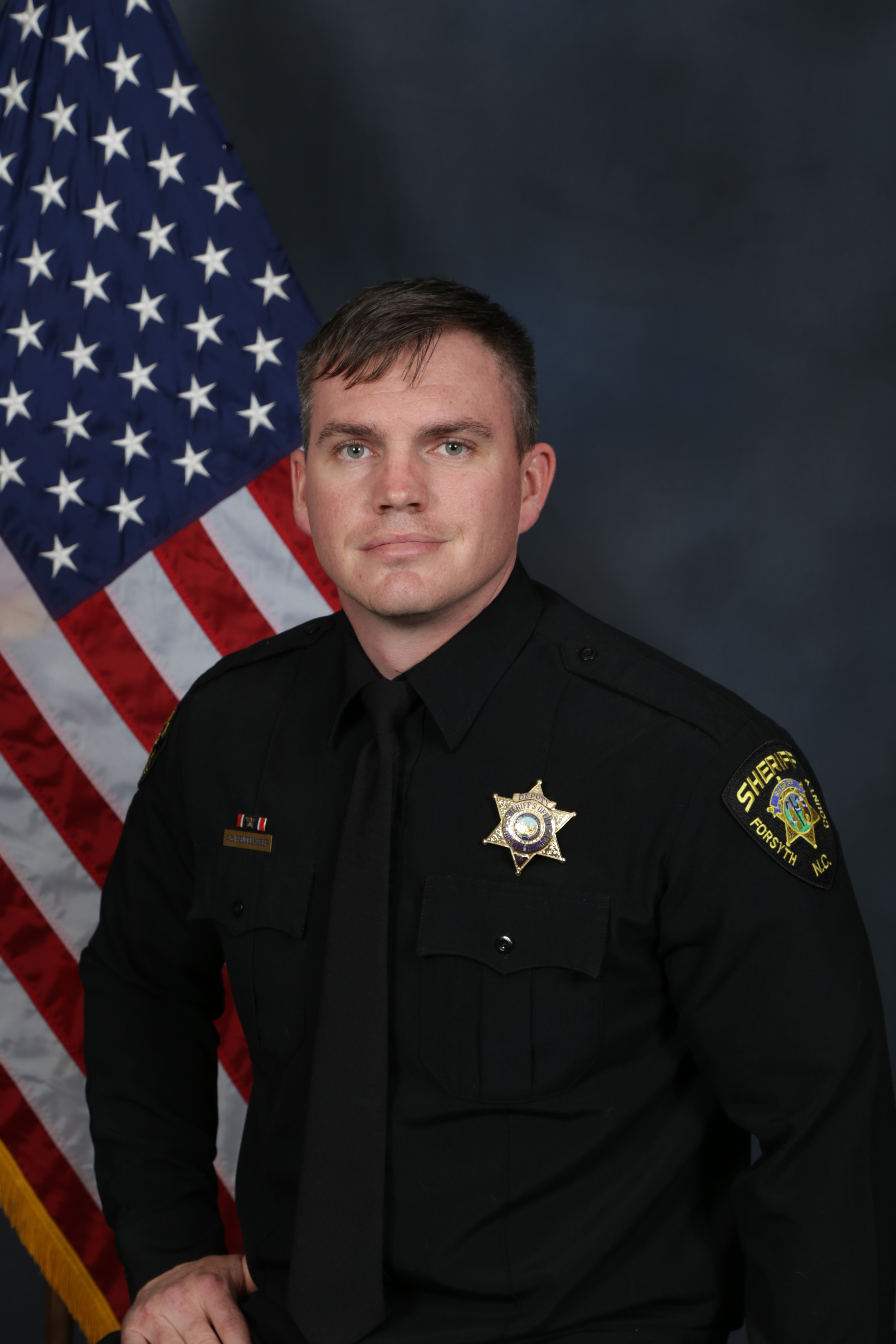 Driver charged in fatal collision with Forsyth County deputy ...